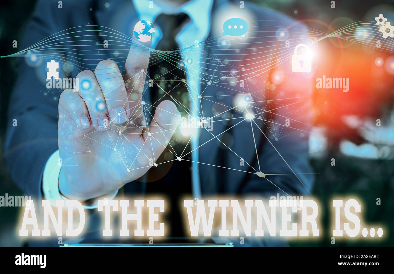 Writing note showing And The Winner Is. Business concept for announcing ...
