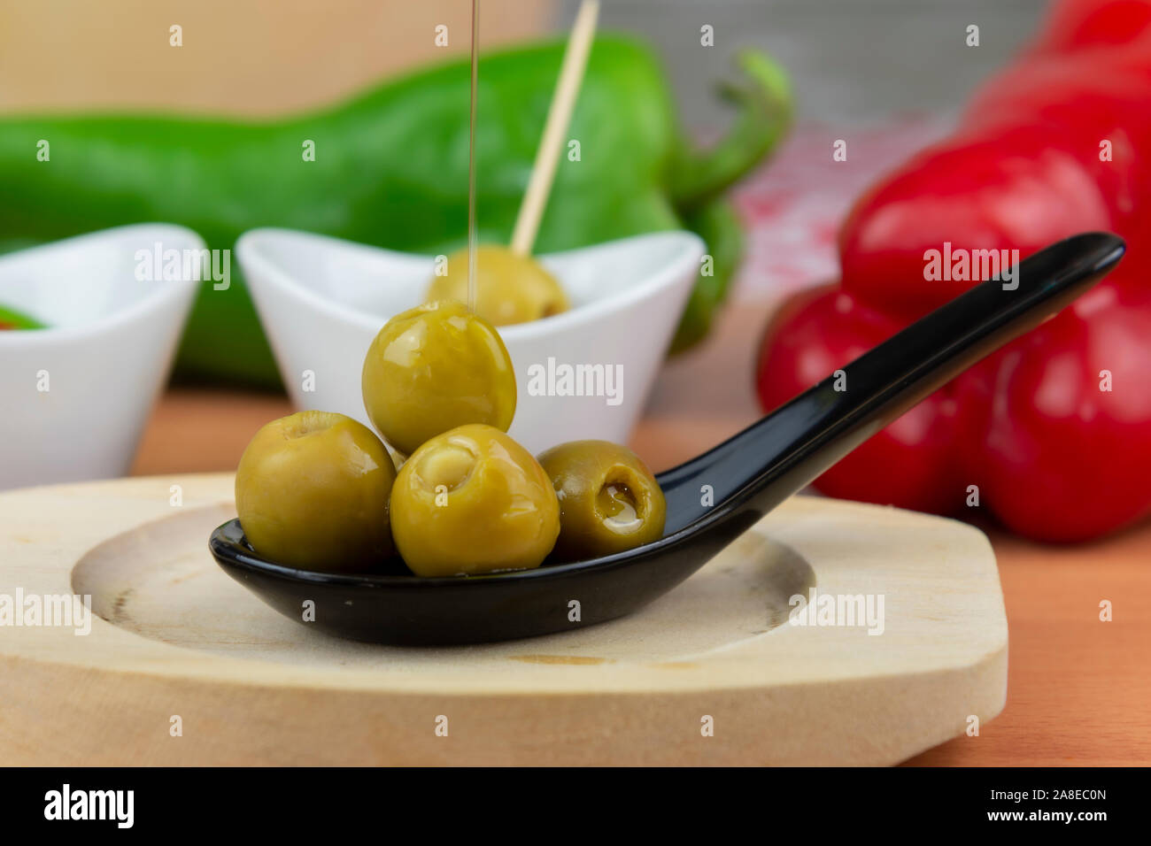 Spanish olives with virgin olive oil Stock Photo - Alamy