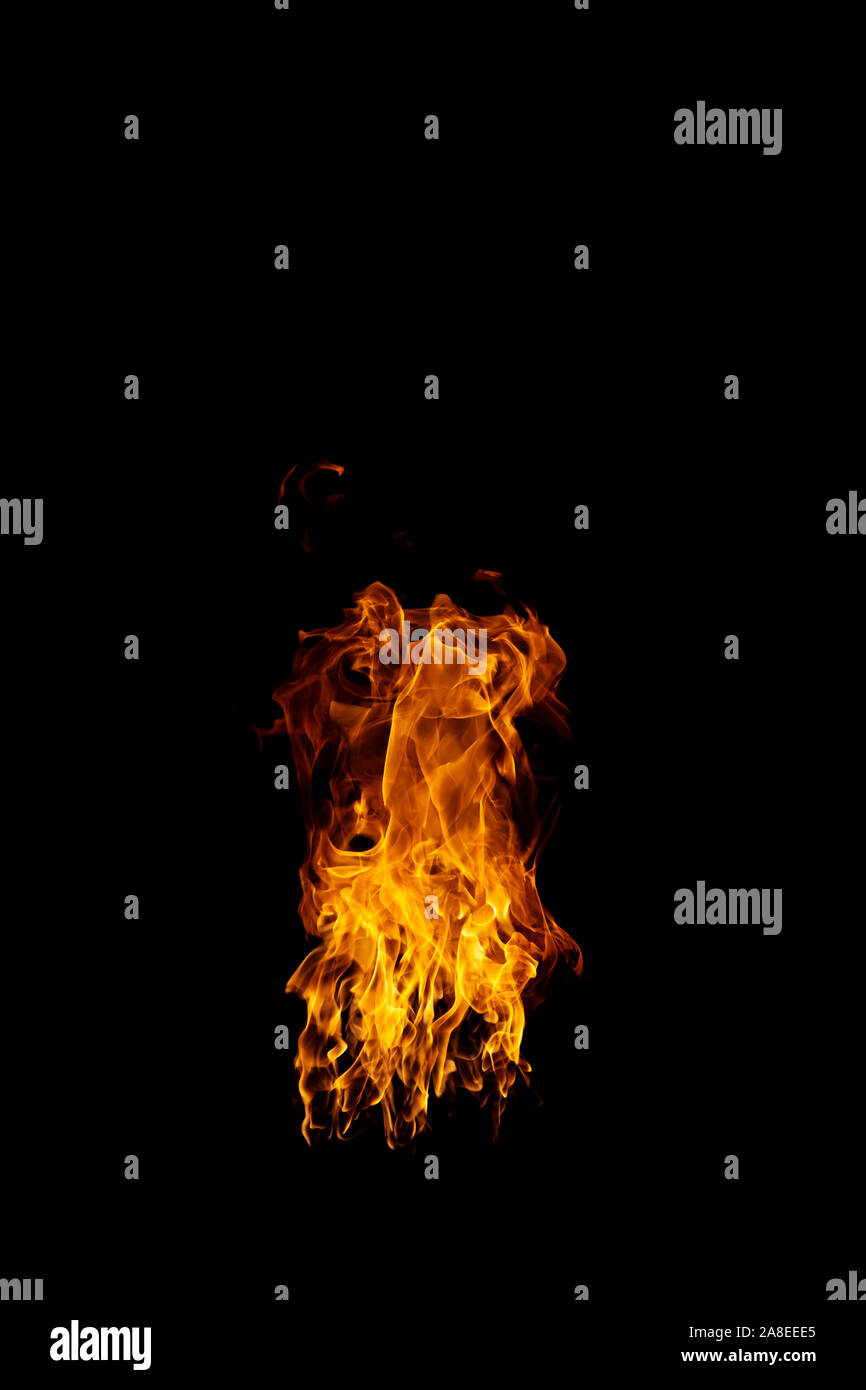 real and hot flames are burning on a black background Stock Photo - Alamy