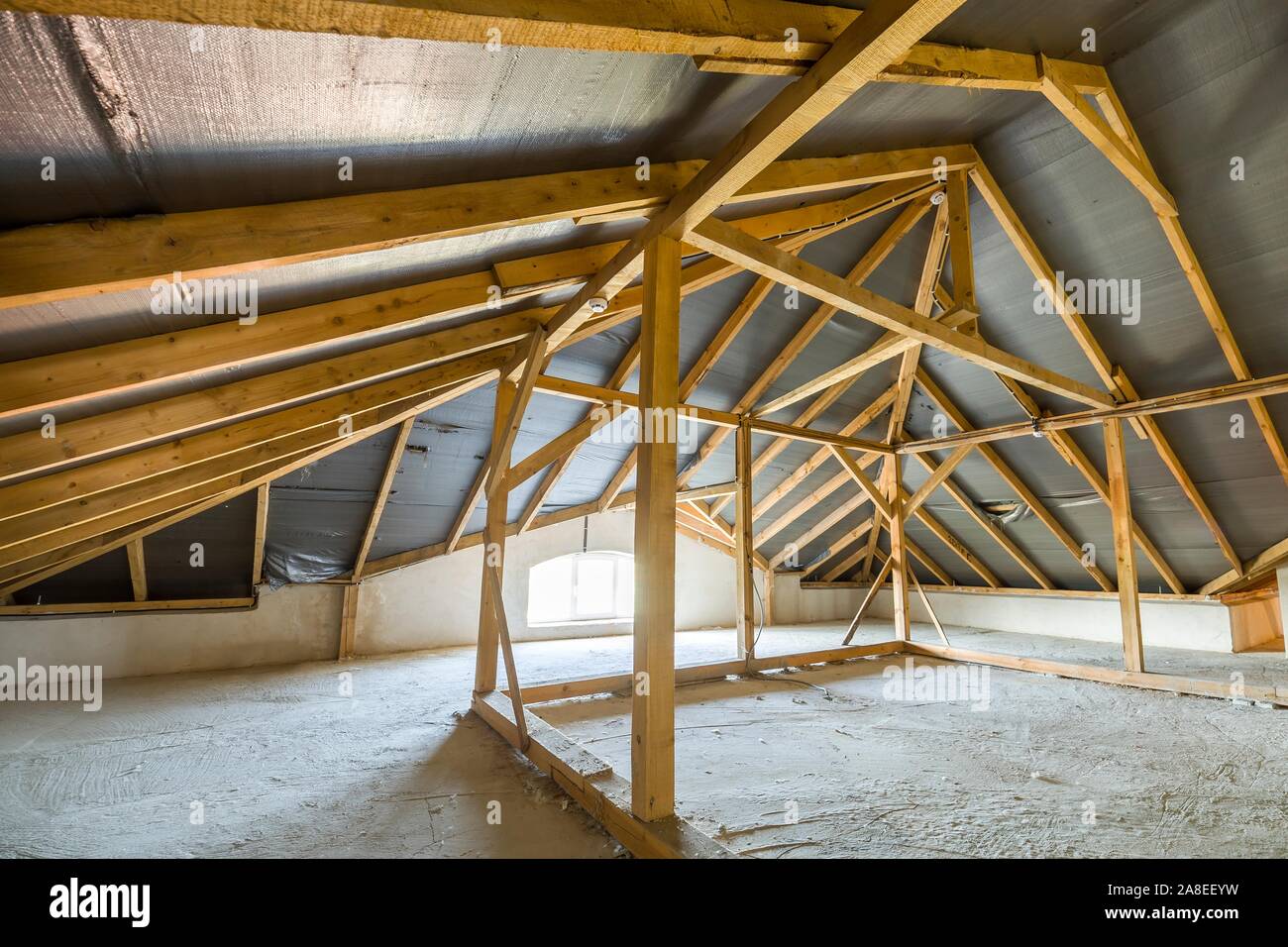 Attic of a building with wooden beams of a roof structure Stock Photo ...