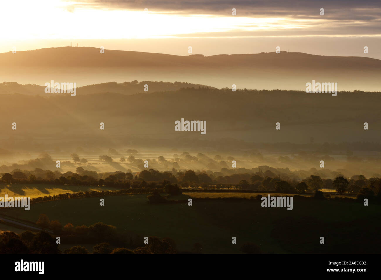 View across Ape Dale to Wenlock Edge and Brown Clee Hill, Shropshire ...