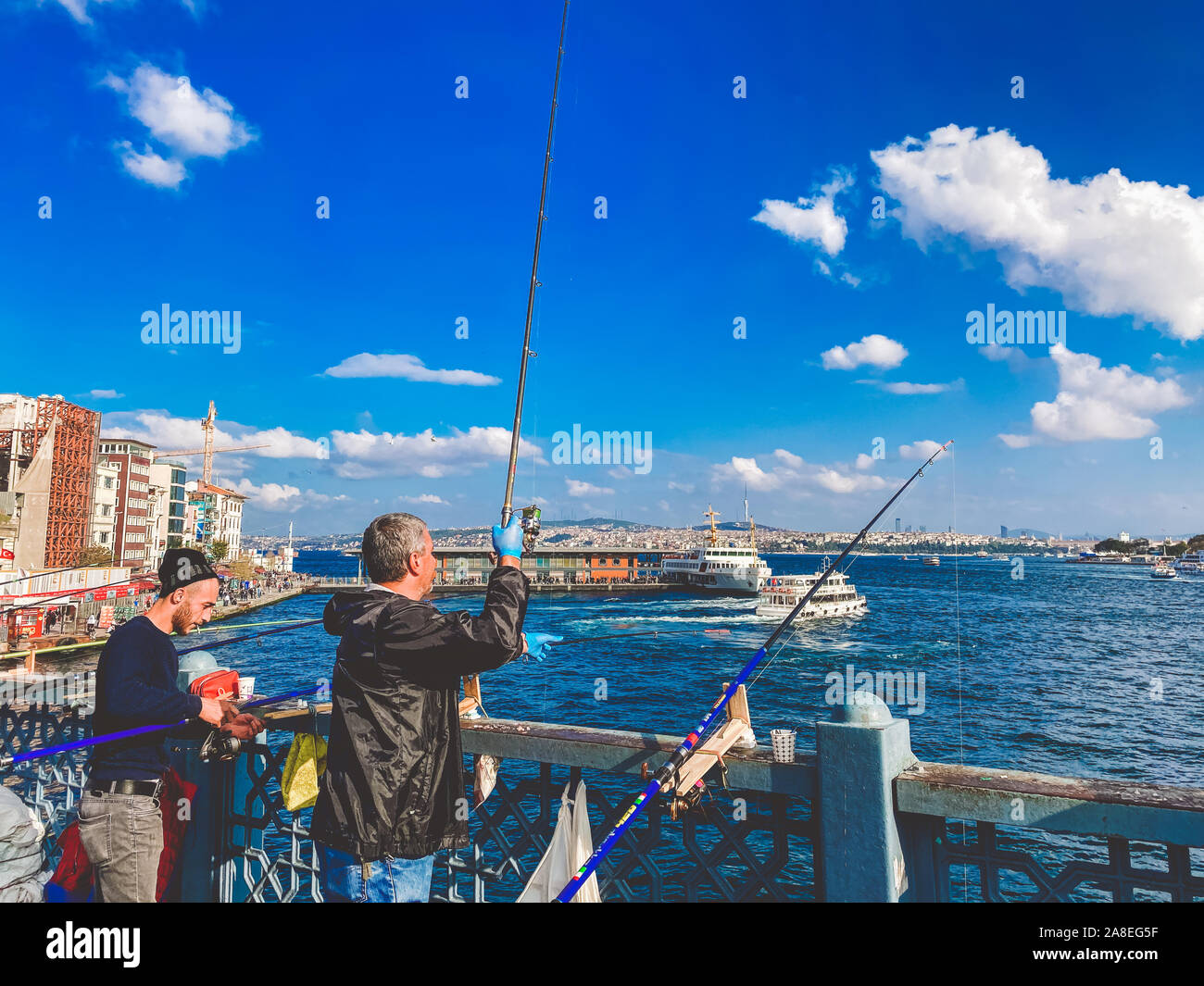 October 27, 2019 Istanbul. Turkey. Fisherman fishing on the Galata ...