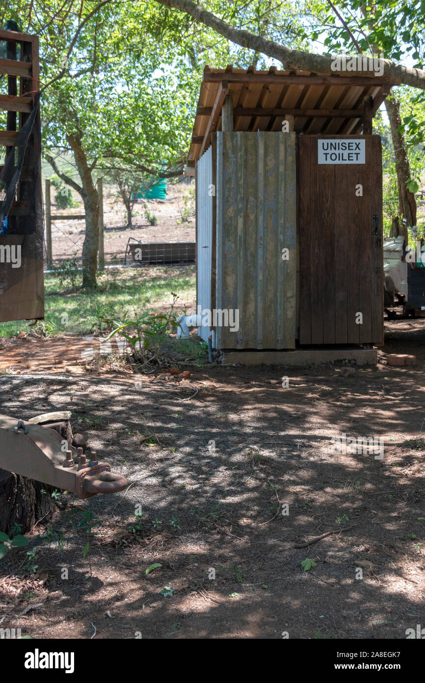 A close up view of a outdoor public toilet on a farm Stock Photo - Alamy