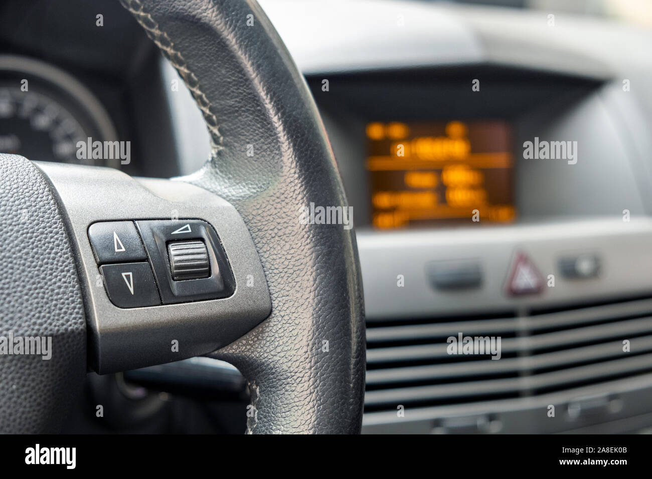 Closeup detail view of a steering wheel of a car Stock Photo - Alamy