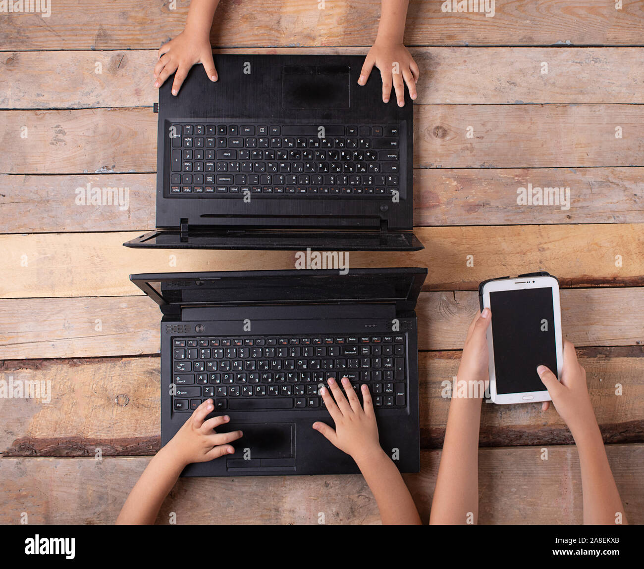 Kids hands using keyboard playing hi-res stock photography and images ...