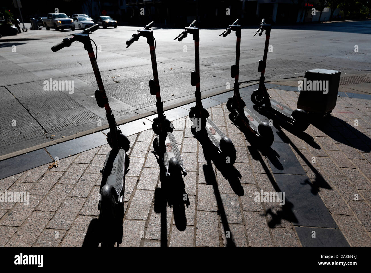 Dockless scooters on a public sidewalk, Austin, Texas, USA Stock Photo ...