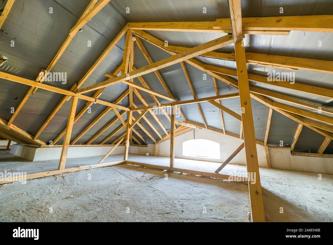Attic of a building with wooden beams of a roof structure Stock Photo ...