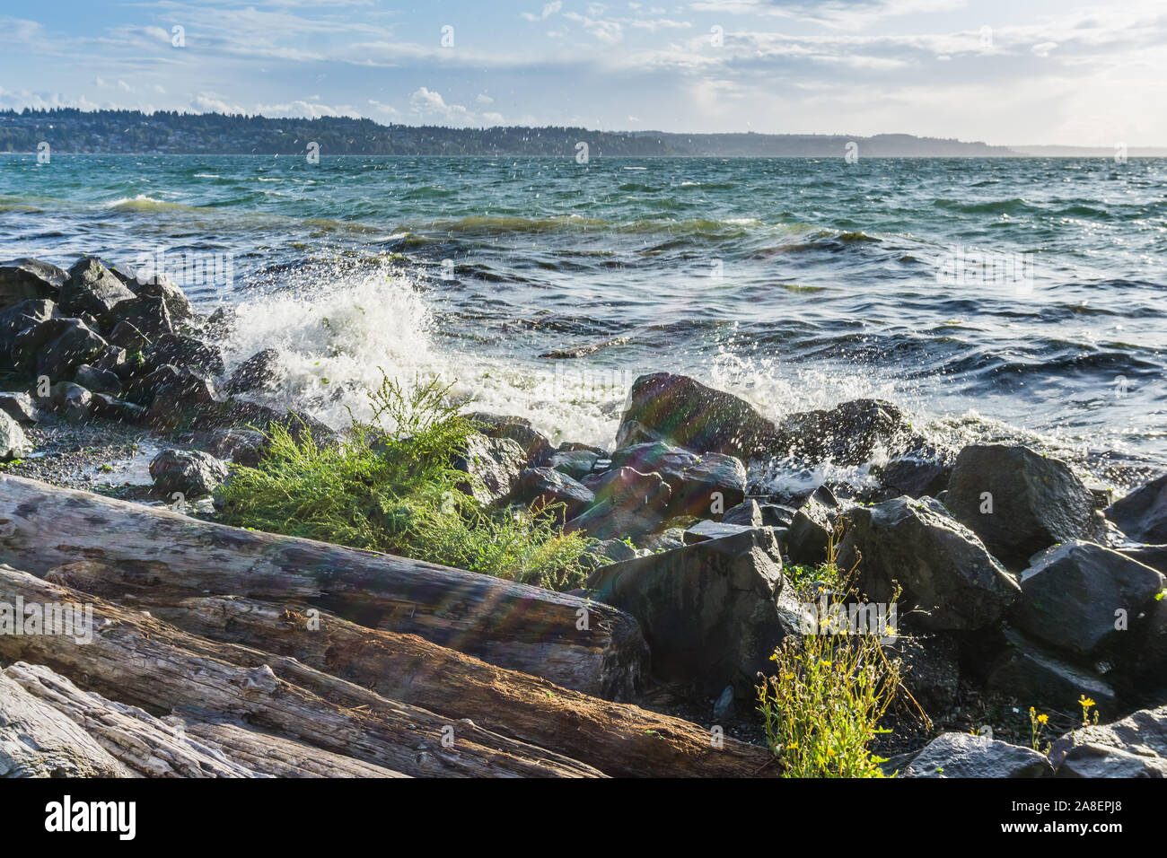 Wave from the Puget Sound hit rocks on the shoreline in Des Moines ...