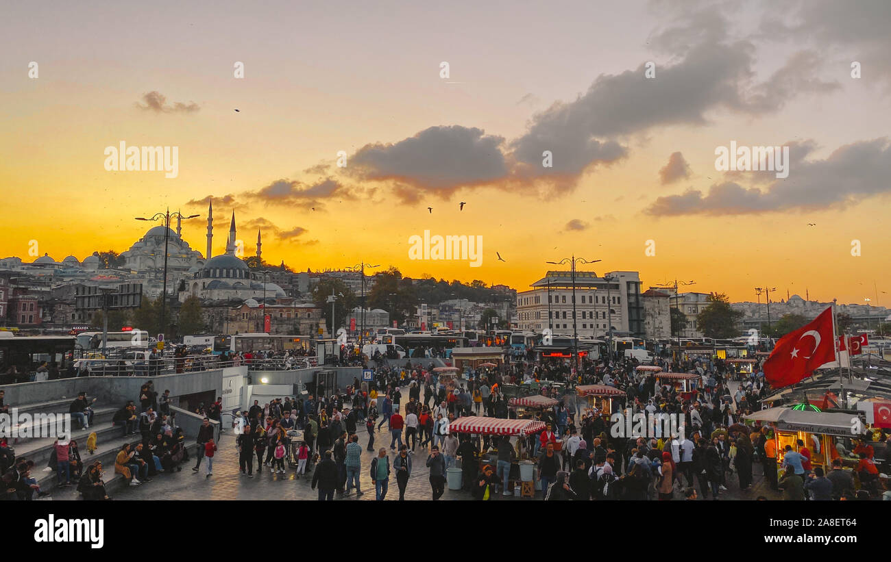 October 27, 2019. Eminonu square by sunset, Istanbul, in Turkey. People ...