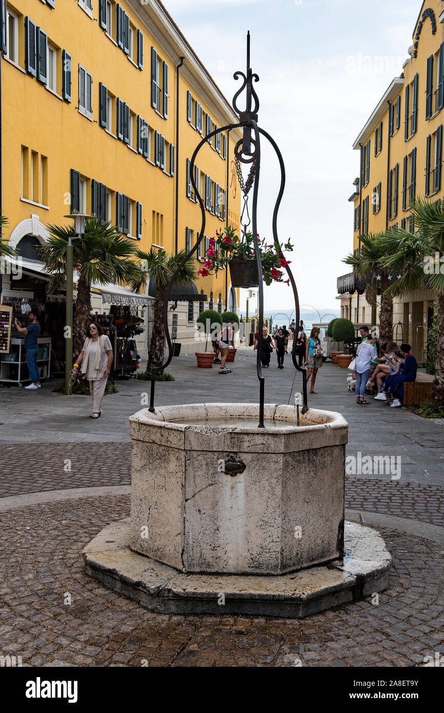 Water well in a square Stock Photo - Alamy
