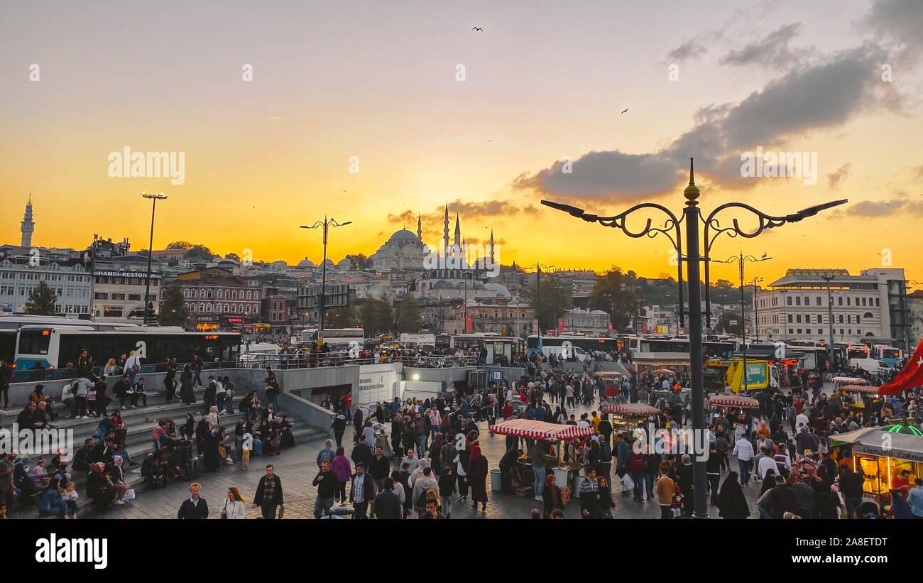 October 27, 2019. Eminonu square by sunset, Istanbul, in Turkey. People ...