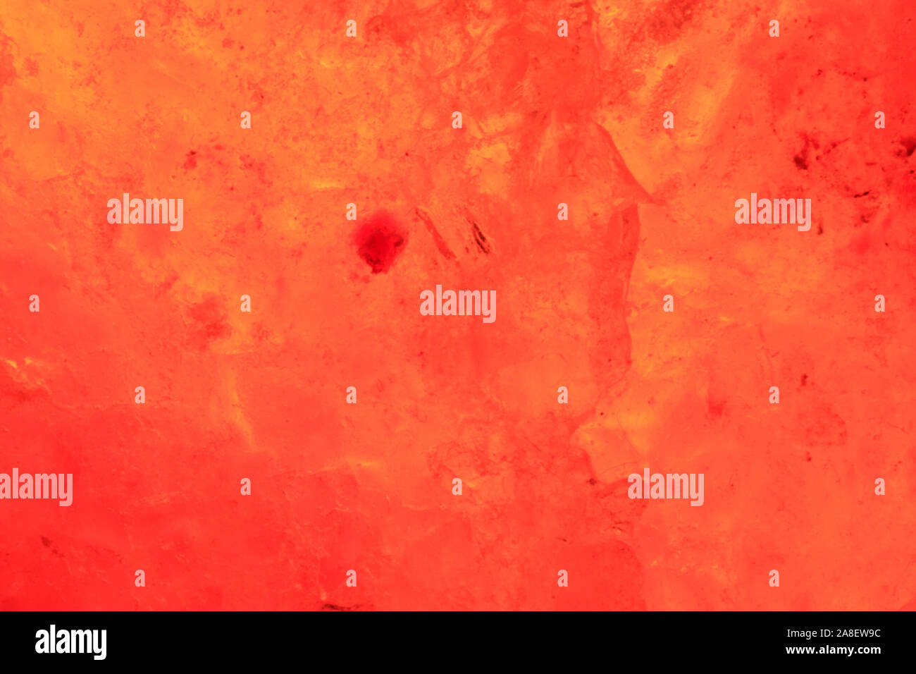 Glowing red salt lamp texture. Abstract background for design Stock ...