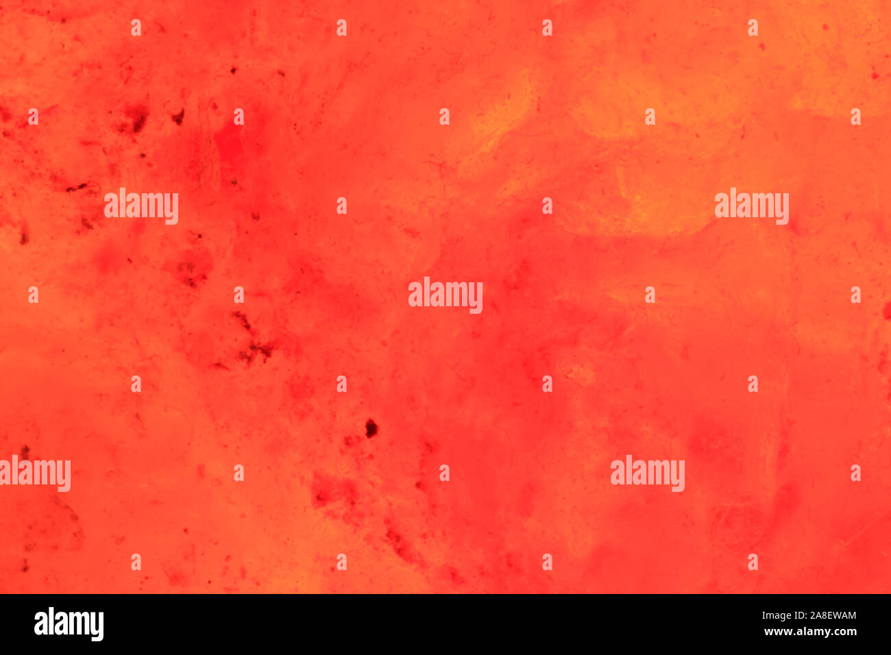 Glowing red salt lamp texture. Abstract background for design Stock ...