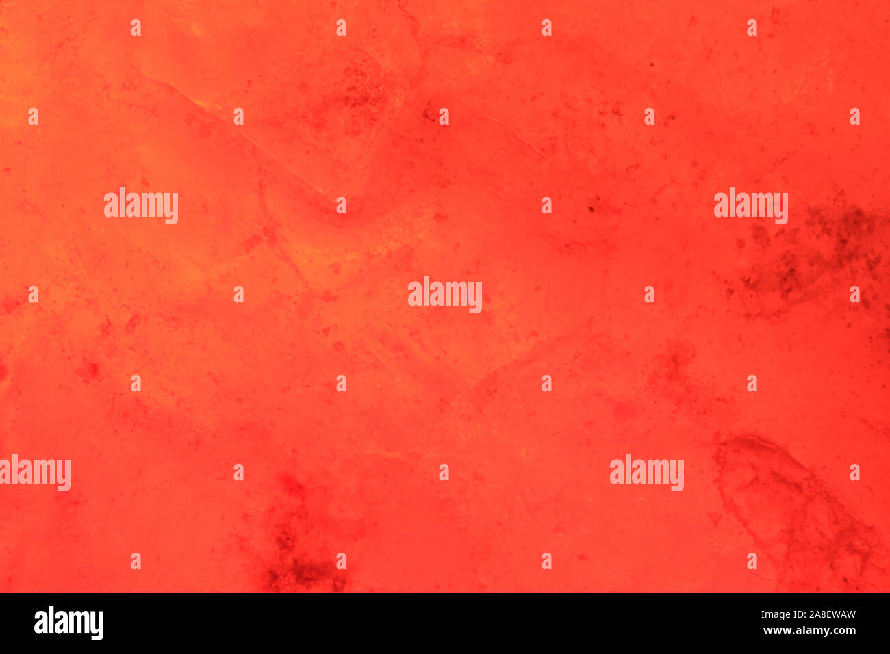 Glowing red salt lamp texture. Abstract background for design Stock ...