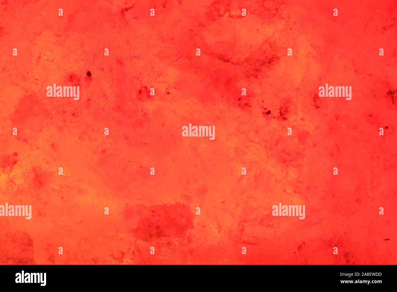 Glowing red salt lamp texture. Abstract background for design Stock ...