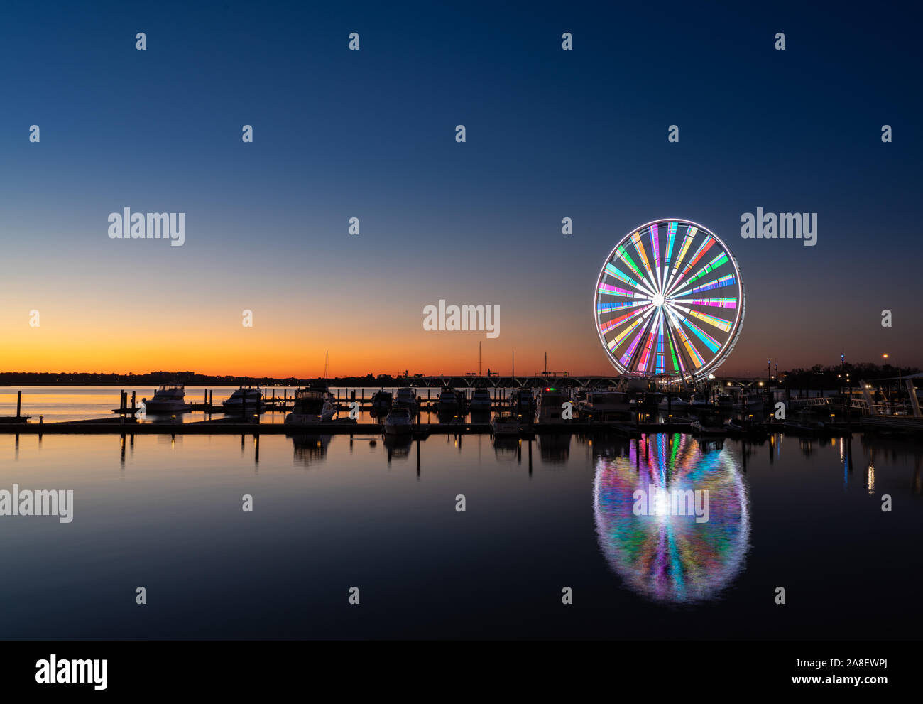 Illuminated ferris wheel at National Harbor near the nation capital of ...