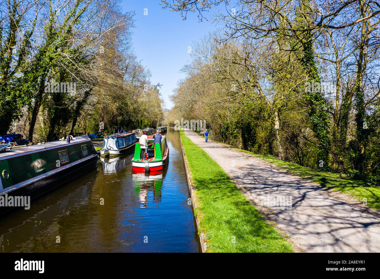 Aerial, overhead view of Narrow boats, canal boats heading down to the ...