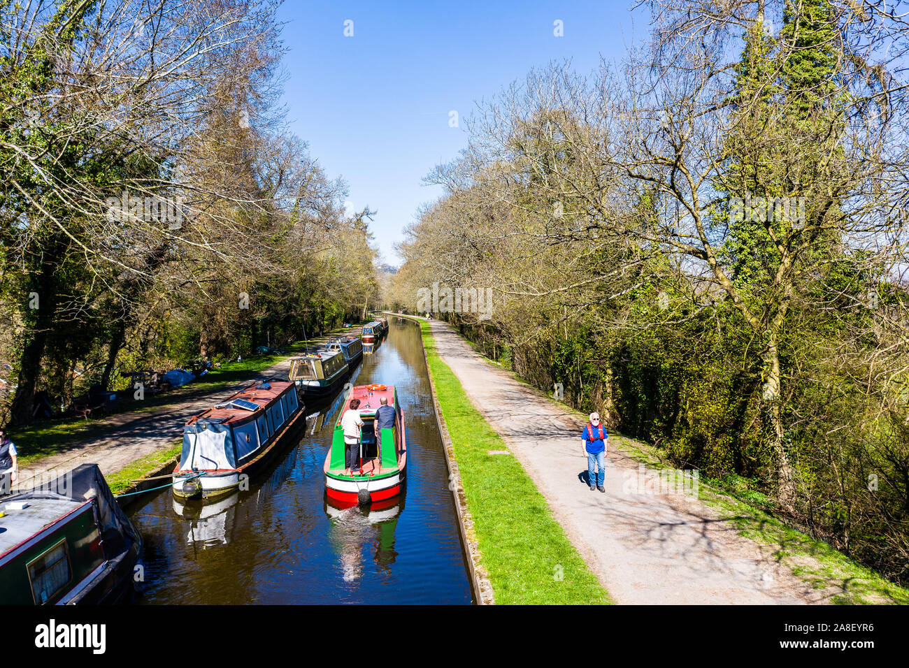 Aerial, overhead view of Narrow boats, canal boats heading down to the ...