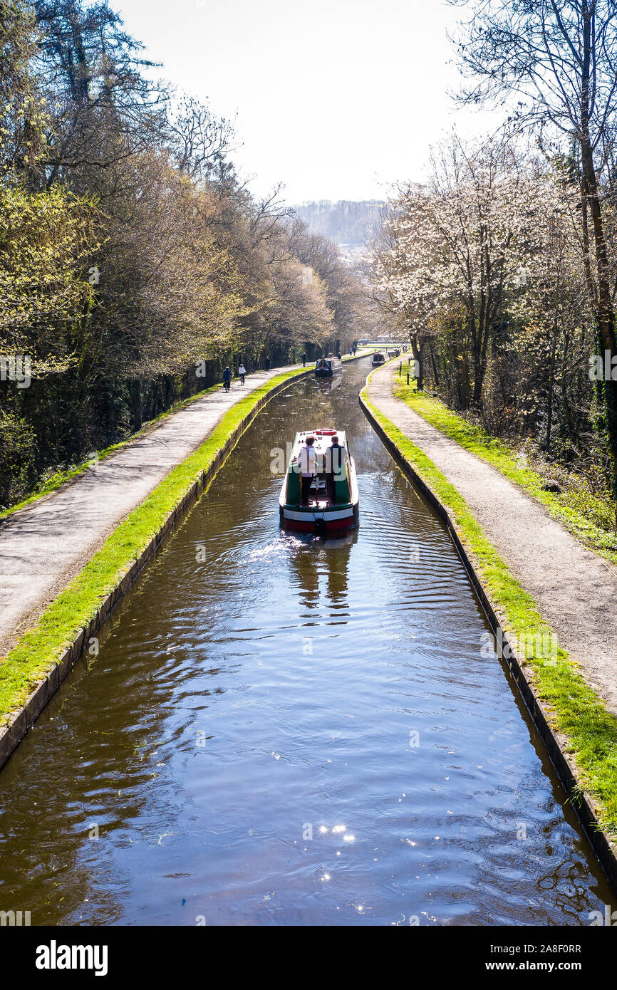 Aerial, overhead view of Narrow boats, canal boats heading down to the ...