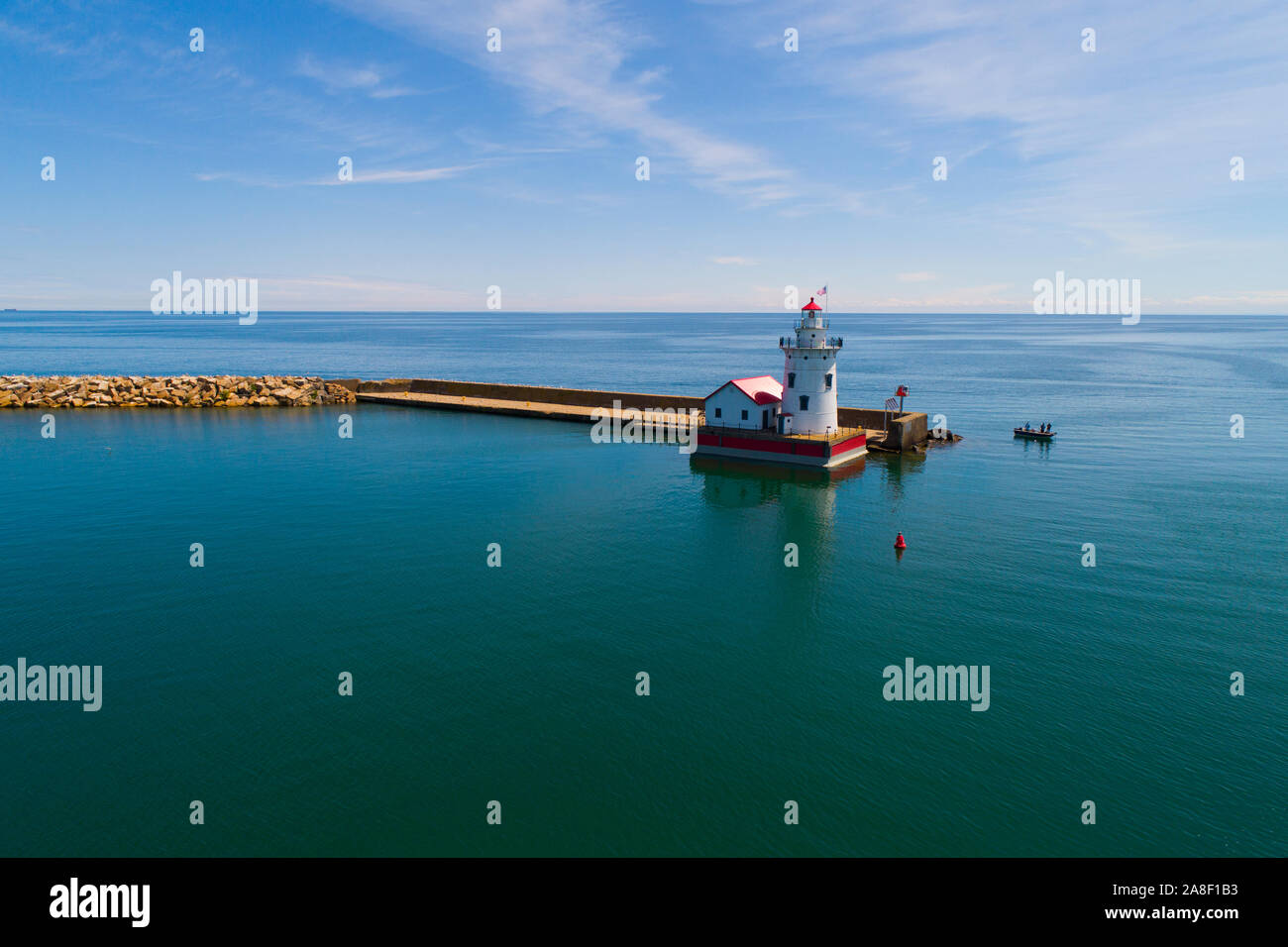 lighthouse and harbor located at Harbor Beach MICHIGAN Stock Photo - Alamy