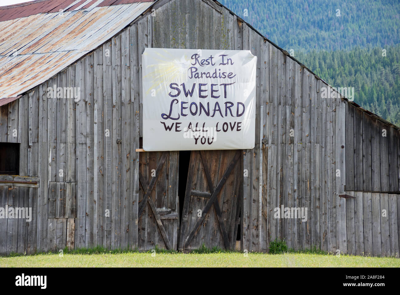 Memorial banner on a barn in Whitney, Oregon Stock Photo - Alamy