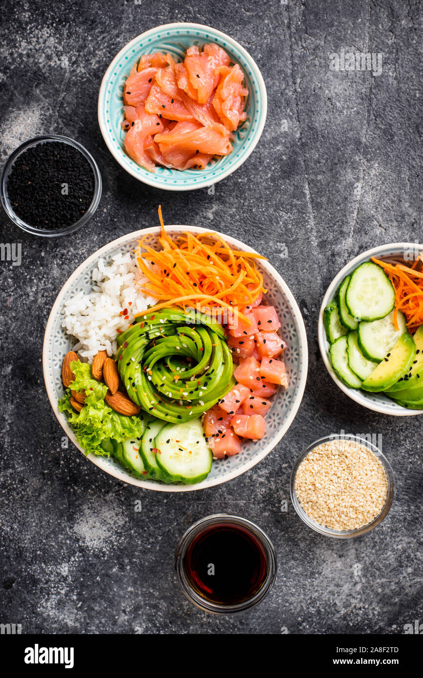 Hawaiian poke bowl with salmon, rice and vegetable Stock Photo - Alamy