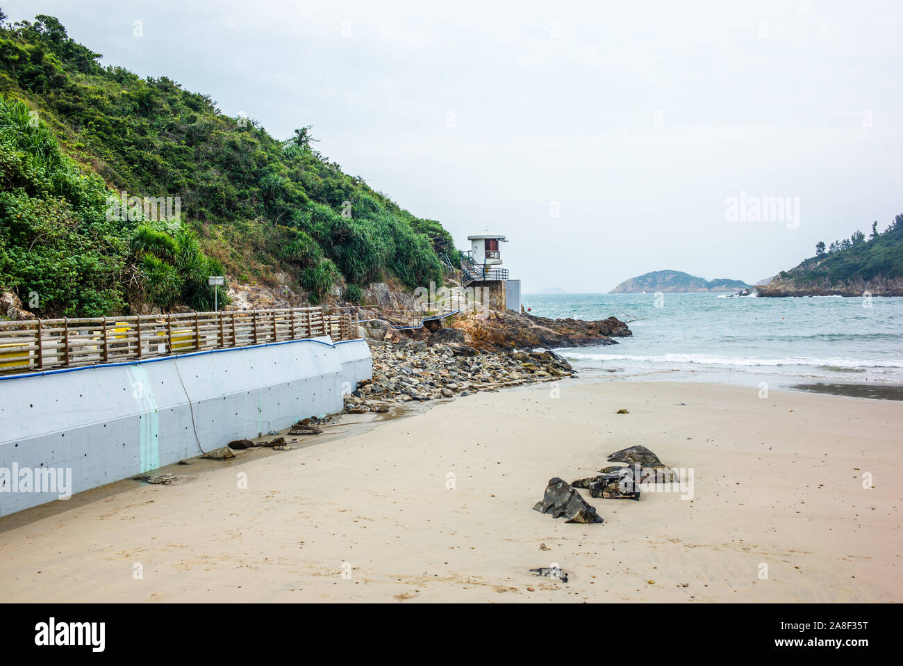 The lifeguards observation tower on the rocks and sand of Big Wave ...