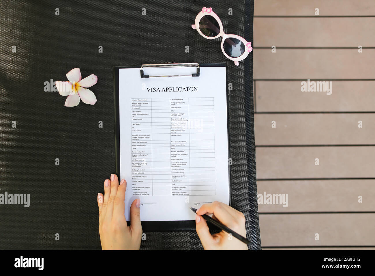 close up portrait of woman hands hold pen and empty paper on hol Stock ...