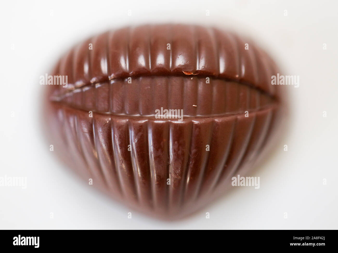 Yummy chocolate candies on white background - Image Stock Photo - Alamy