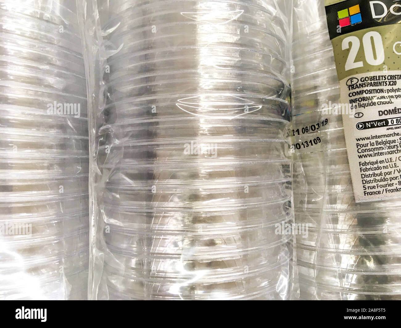 Single use plastic glasses packed under plastic package, Lyon, France ...
