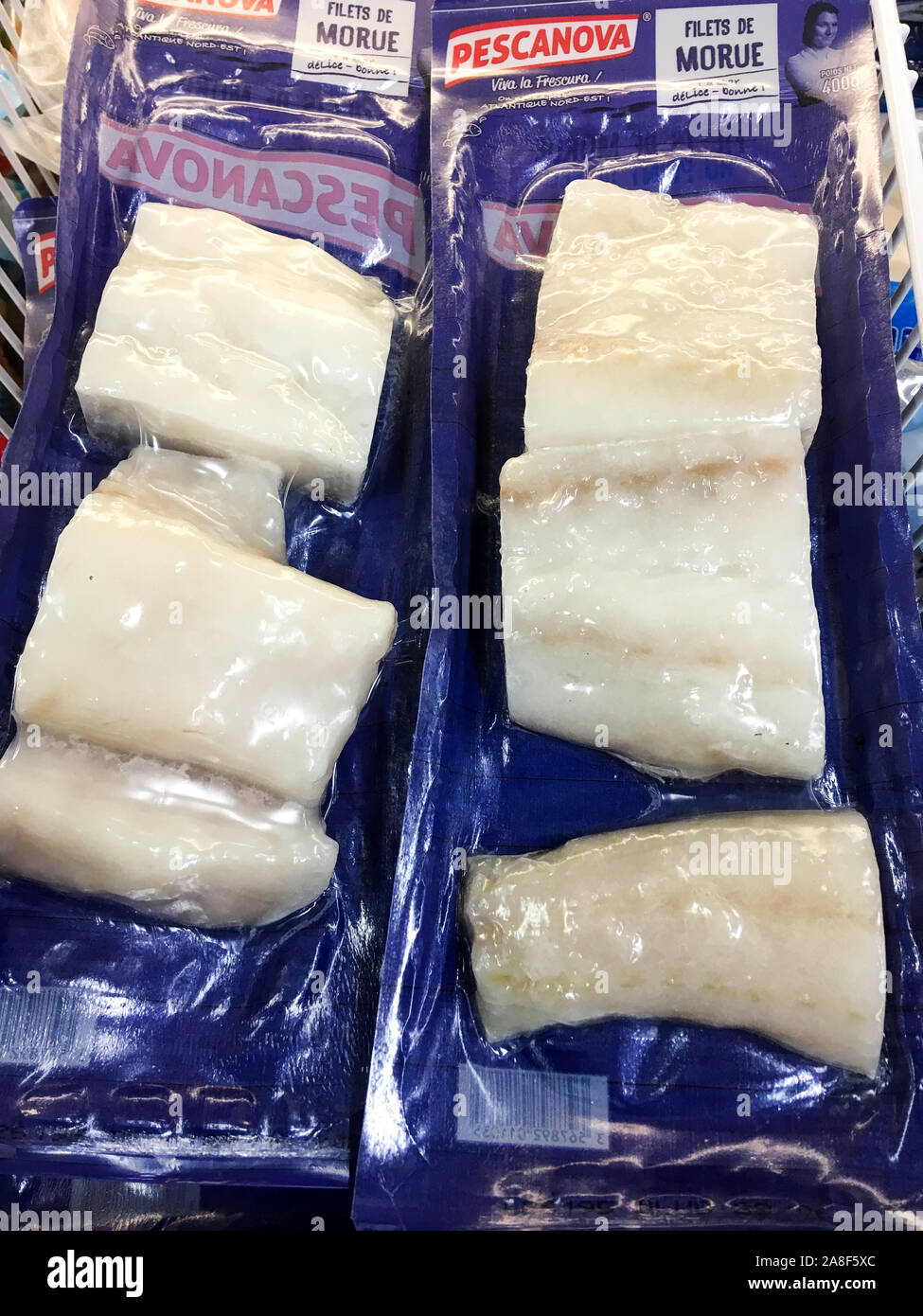 Frozen cut pieces of fish under plastic package, Lyon, France Stock ...
