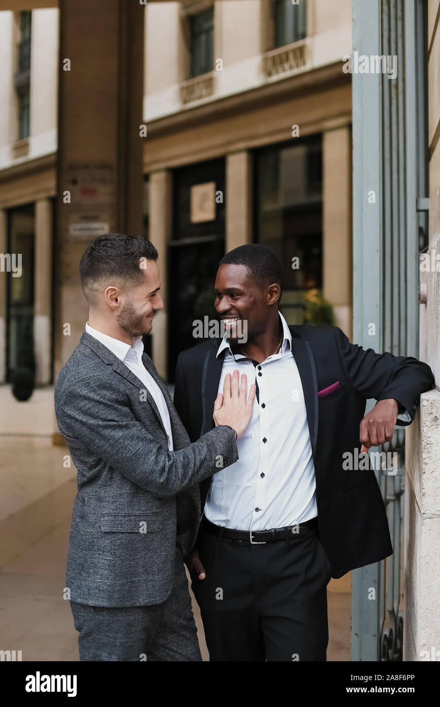 Black men suits talking hi-res stock photography and images - Alamy
