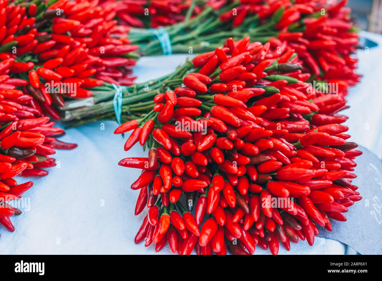 A bunch of bright red ripe peppers on the market of Provence - the ...