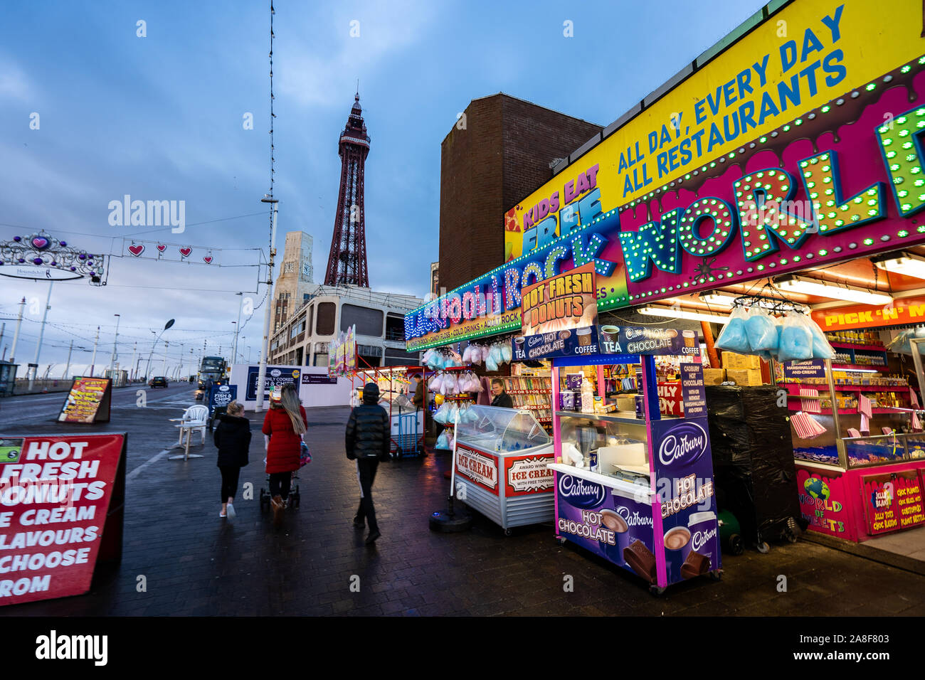 The world famous Blackpool Tower and beach surrounded by hotels, pubs ...