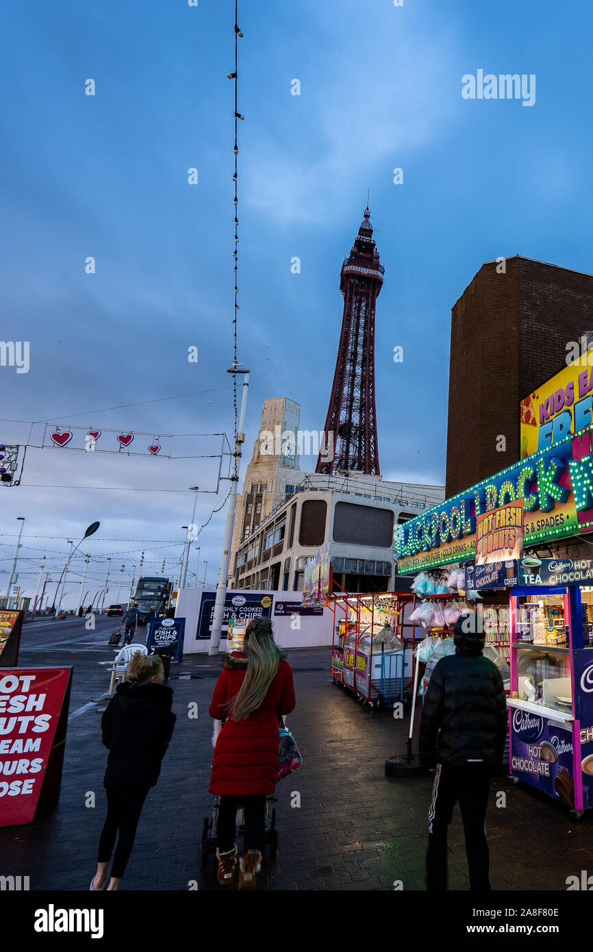 The world famous Blackpool Tower and beach surrounded by hotels, pubs ...