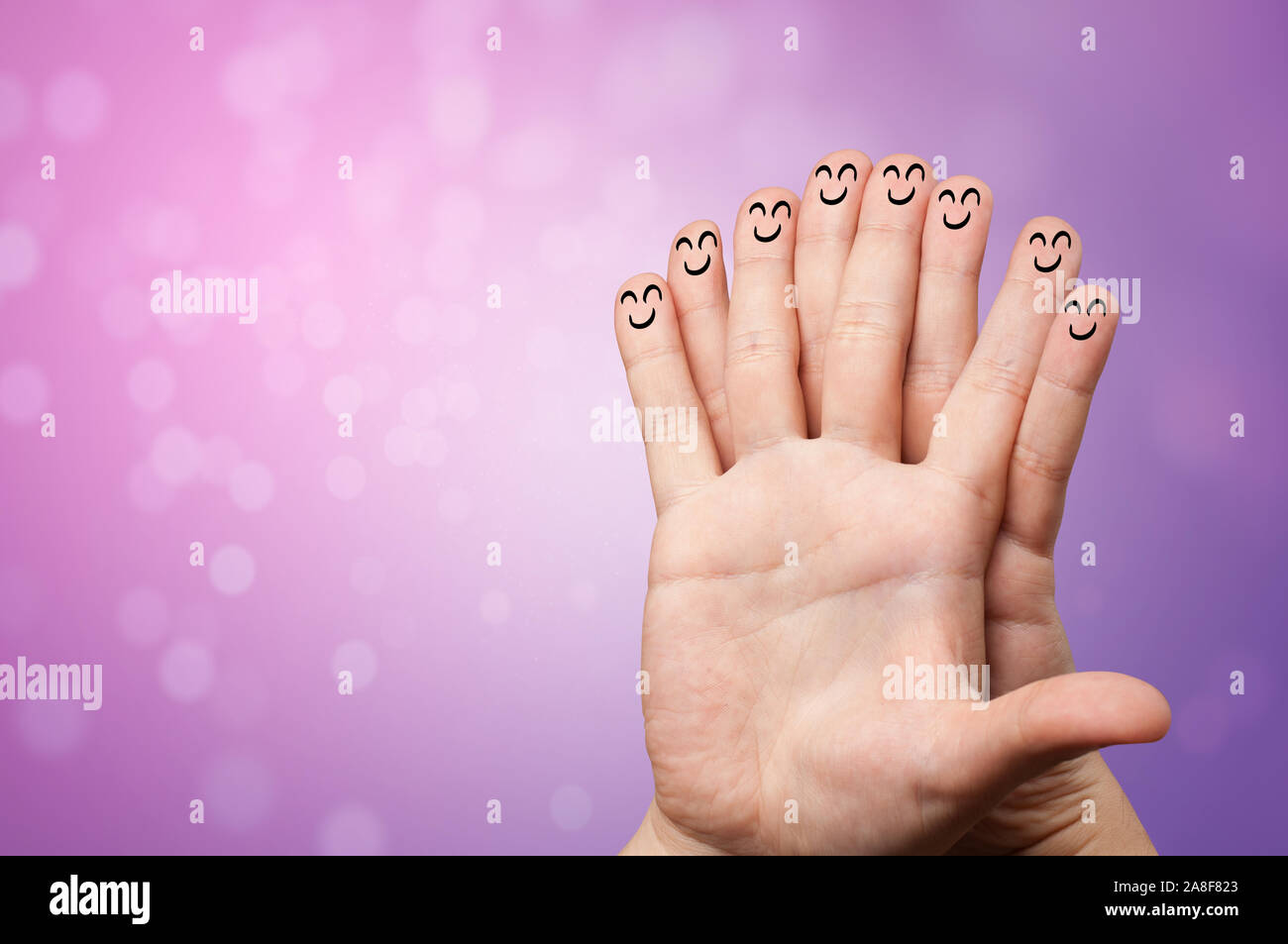 Joyful fingers smiling with colorful background concept Stock Photo - Alamy