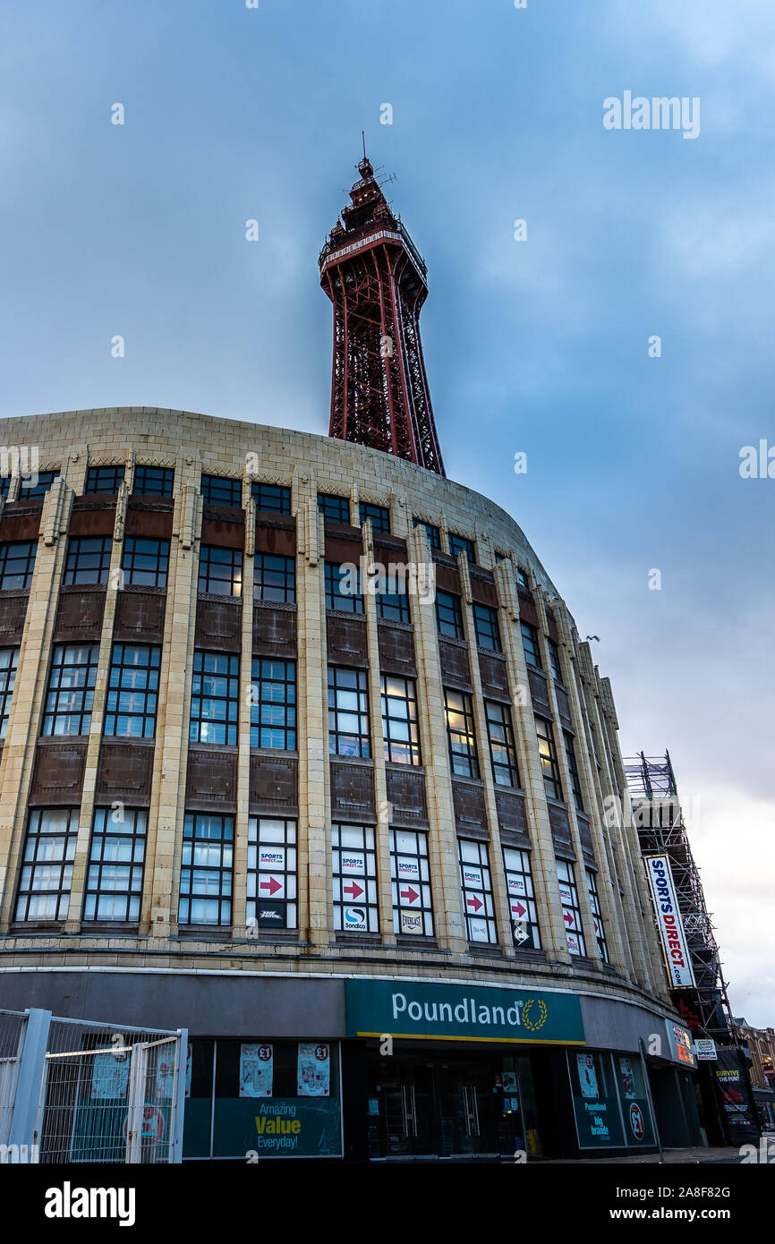 The world famous Blackpool Tower and beach surrounded by hotels, pubs ...