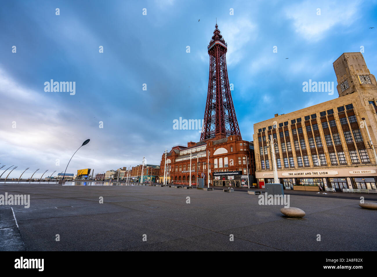 The world famous Blackpool Tower and beach surrounded by hotels, pubs ...