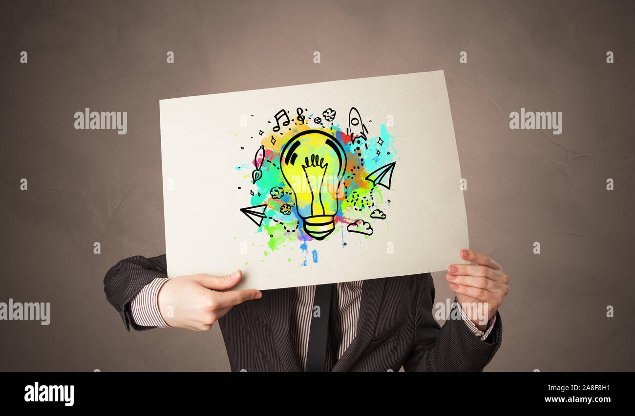 Person holding a paper with a drawn colorful idea concept Stock Photo ...