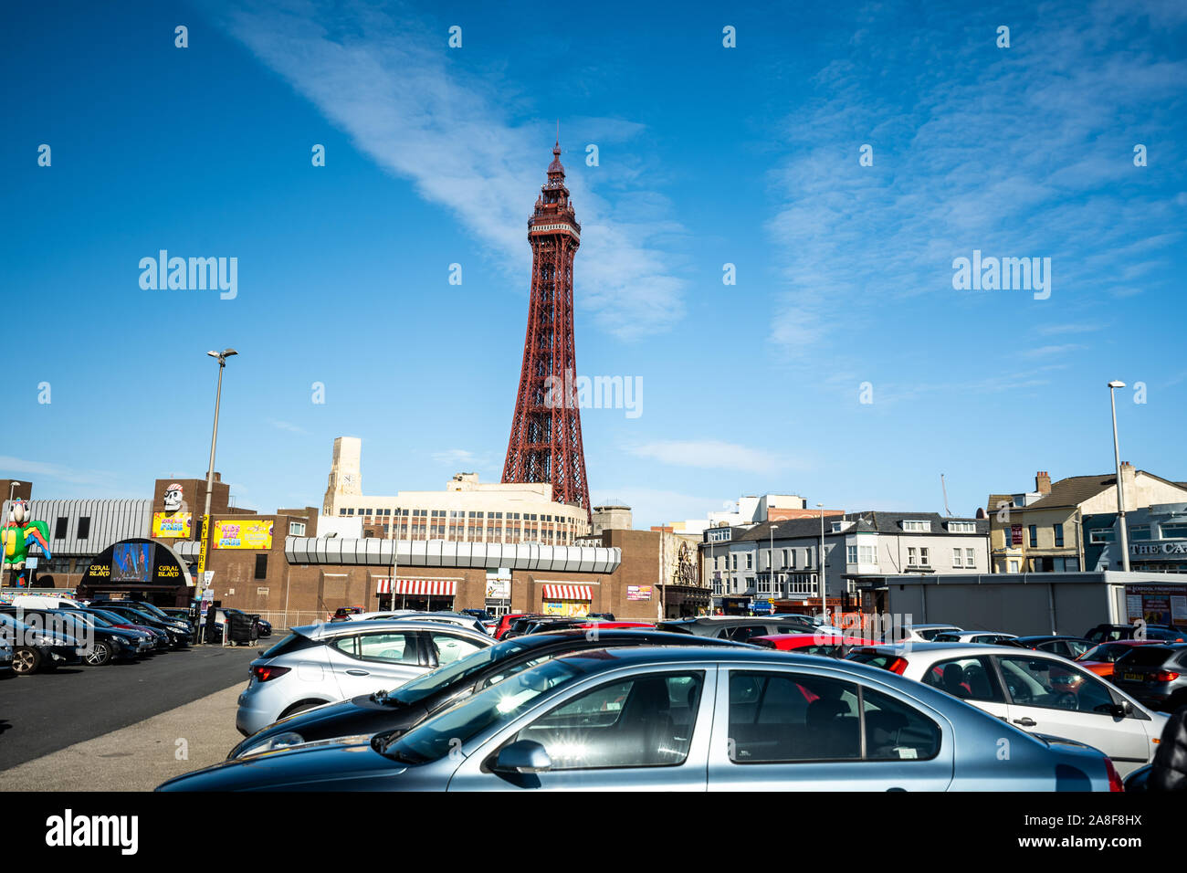 The world famous Blackpool Tower and beach surrounded by hotels, pubs ...