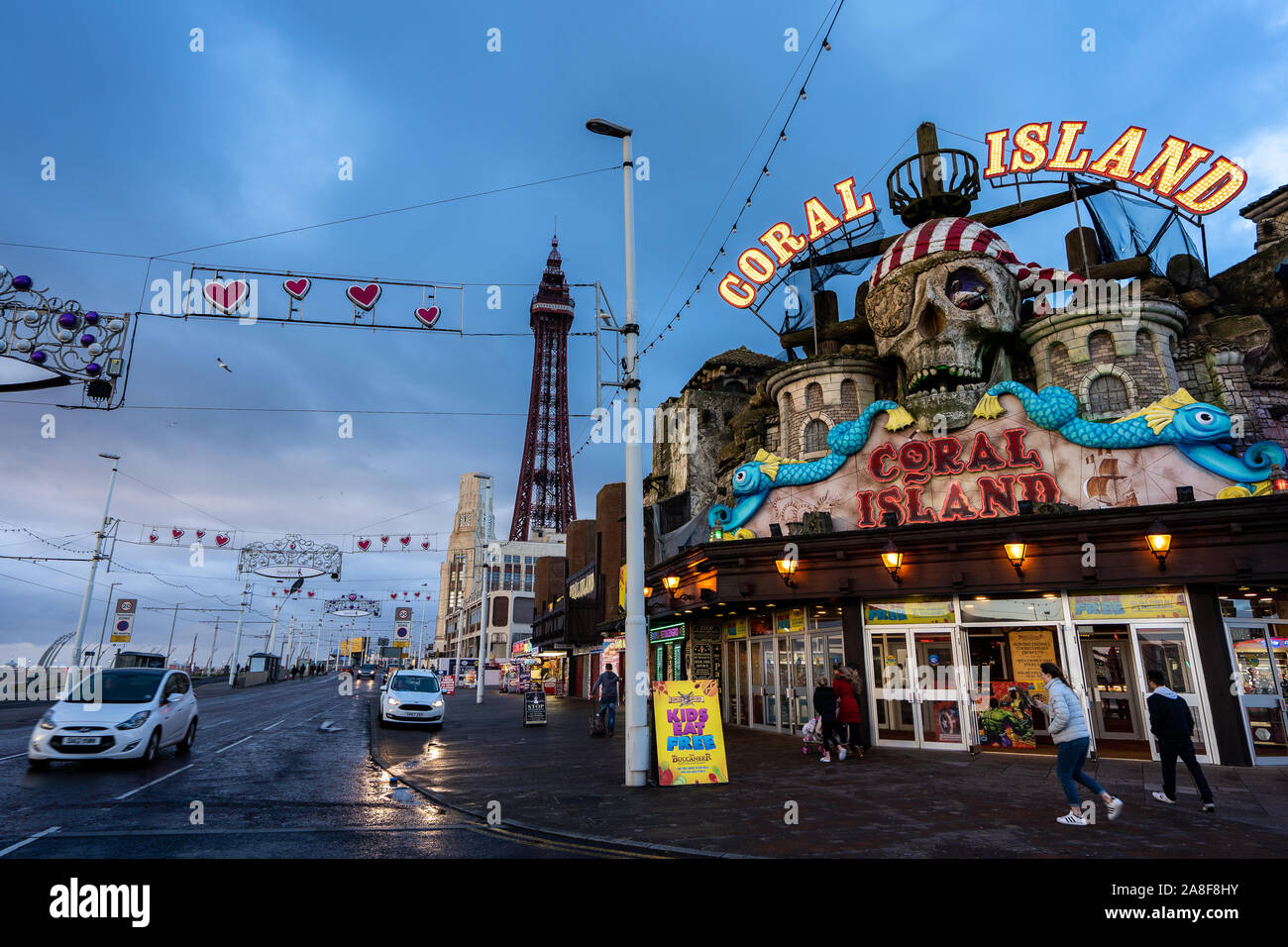 The world famous Blackpool Tower and beach surrounded by hotels, pubs ...