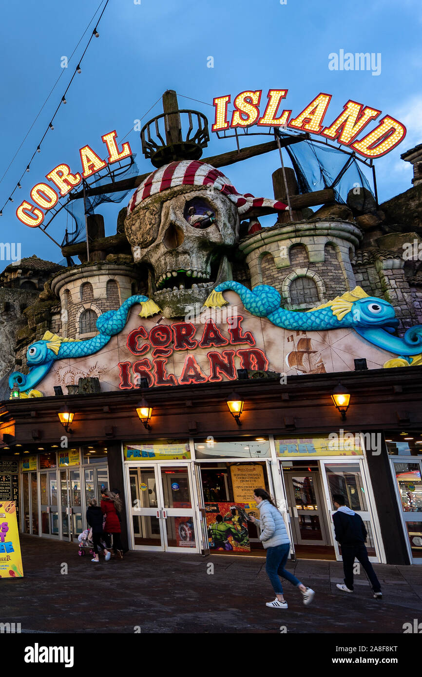 The world famous Blackpool Tower and beach surrounded by hotels, pubs ...