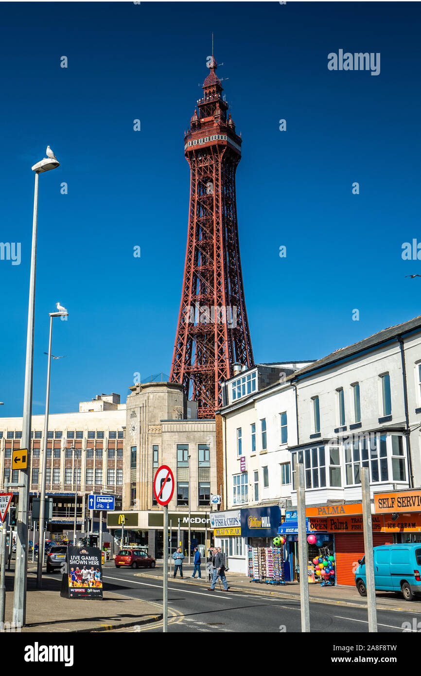 The world famous Blackpool Tower and beach surrounded by hotels, pubs ...