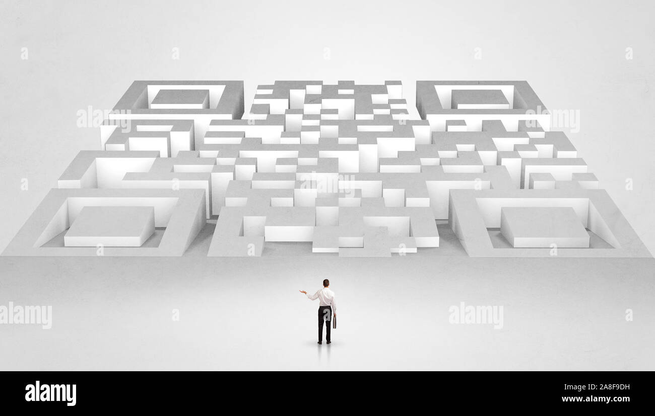 Businessman standing and thinking in top of a huge maze Stock Photo - Alamy