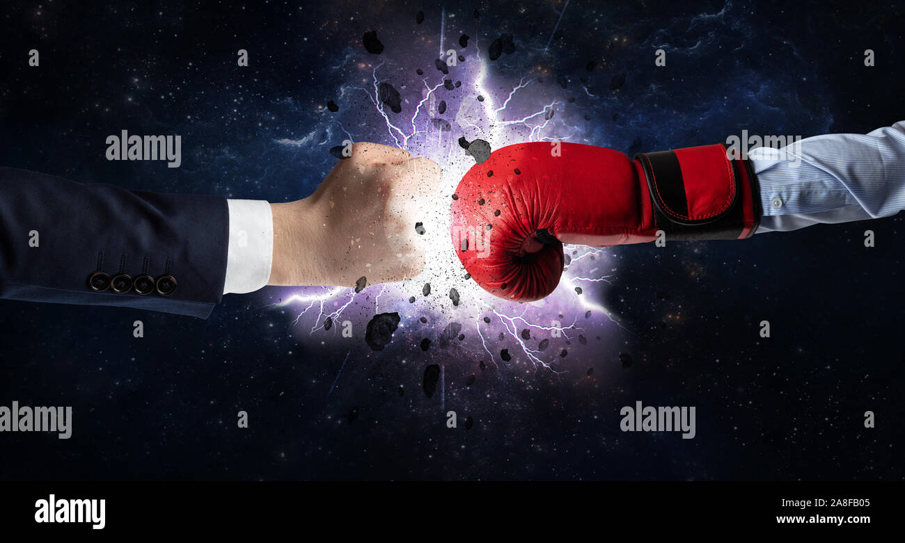 Two hands fighting with storm explosion concept Stock Photo - Alamy