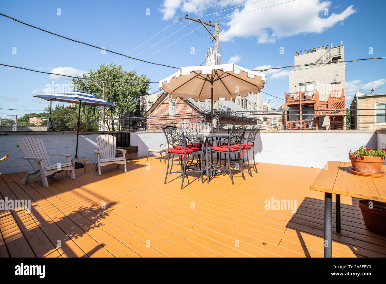 A Chicago rooftop patio with plenty of space and seating with an ...