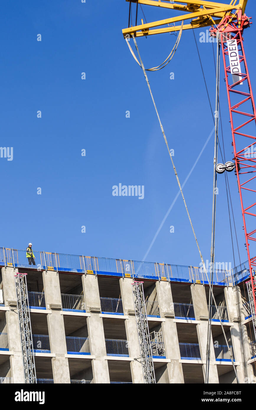 Hilton building cranes structure hi-res stock photography and images ...