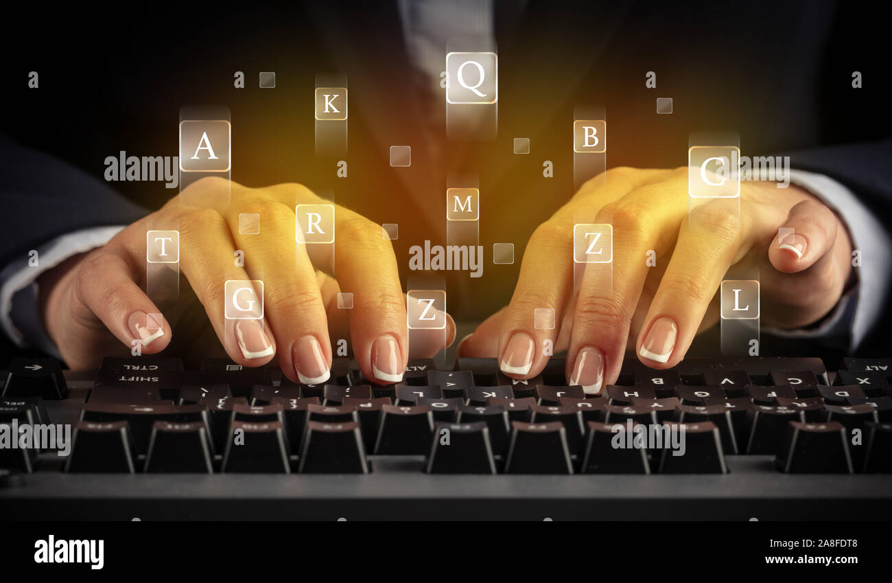 Business woman typing on keyboard with letters around Stock Photo - Alamy