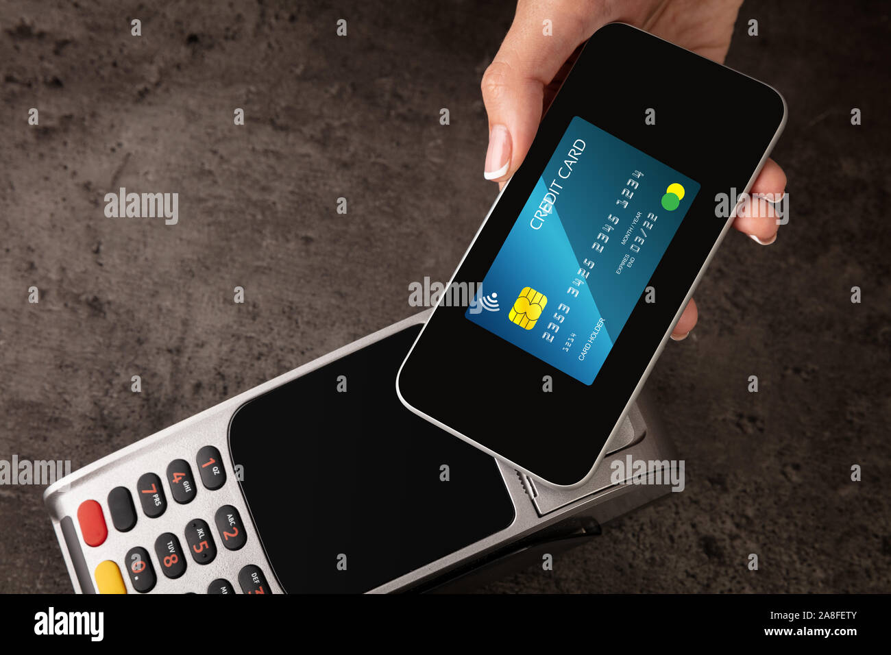 Transaction completed on terminal with mobile credit card Stock Photo ...