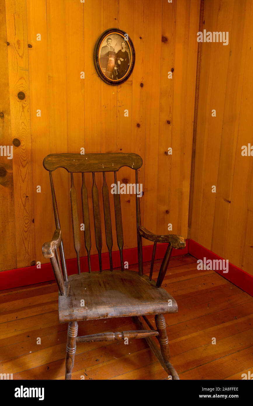 Vintage rocking chair and photograph in the historic Fred Riddle House ...